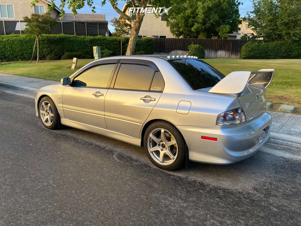 2003 Mitsubishi Lancer Evolution with 17x9 Enkei T6s and Falken 245x45 ...