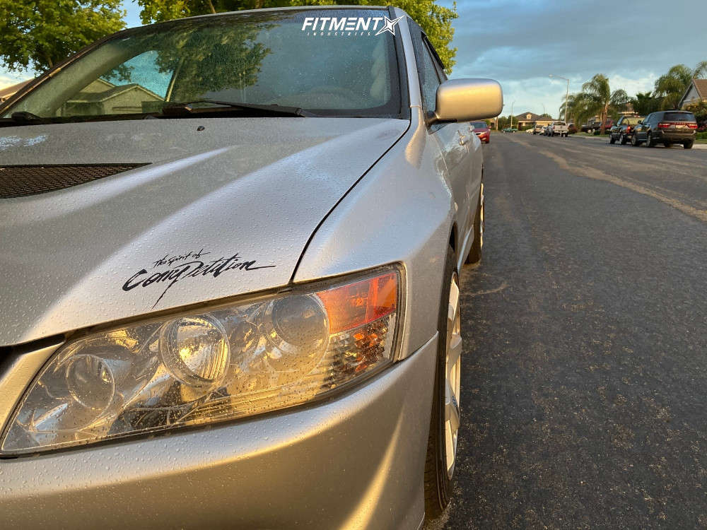 2003 Mitsubishi Lancer Evolution with 17x9 Enkei T6s and Falken 245x45 ...
