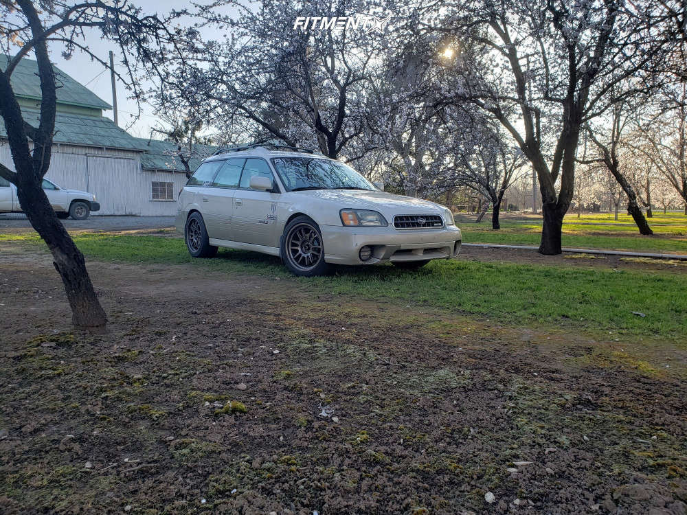 2004 Subaru Outback H6 with 18x9 Cosmis Racing XT-206R and Firestone ...