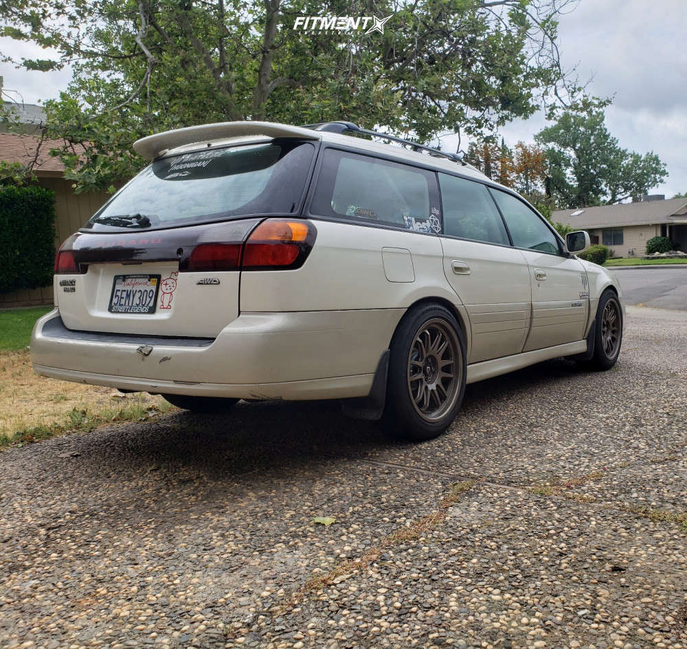 2004 Subaru Outback H6 with 18x9 Cosmis Racing XT-206R and Firestone ...