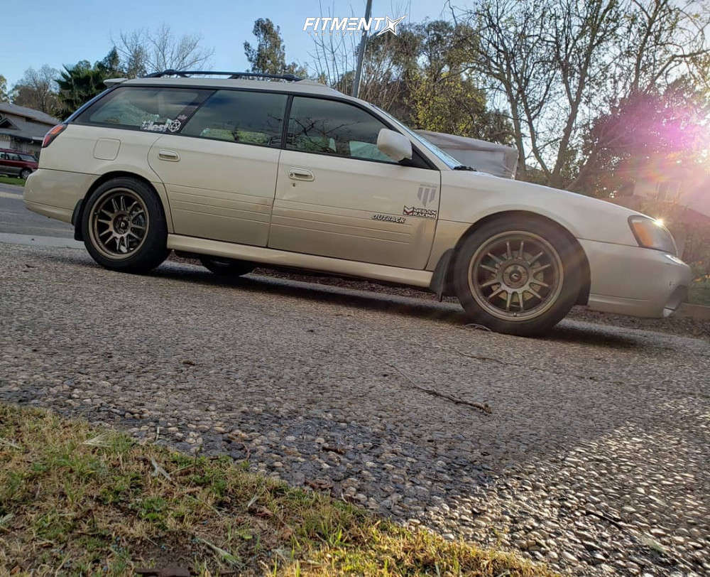 2004 Subaru Outback H6 with 18x9 Cosmis Racing XT-206R and Firestone ...