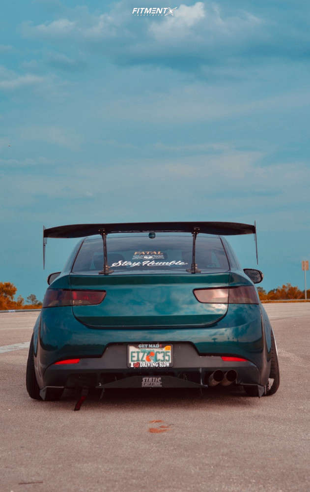 2010 Kia Forte Koup EX with 17x9.5 SSR Sp1 and Cosmo 205x40 on ...