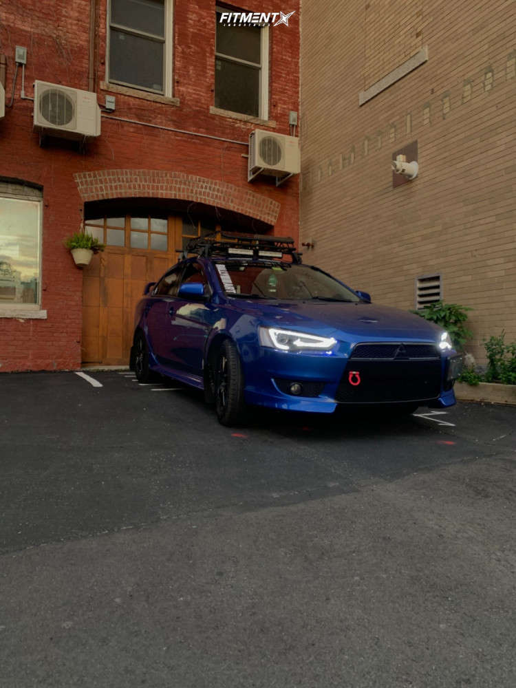 2011 Mitsubishi Lancer ES with 16x7 Enkei Edr9 and General 215x60 on ...