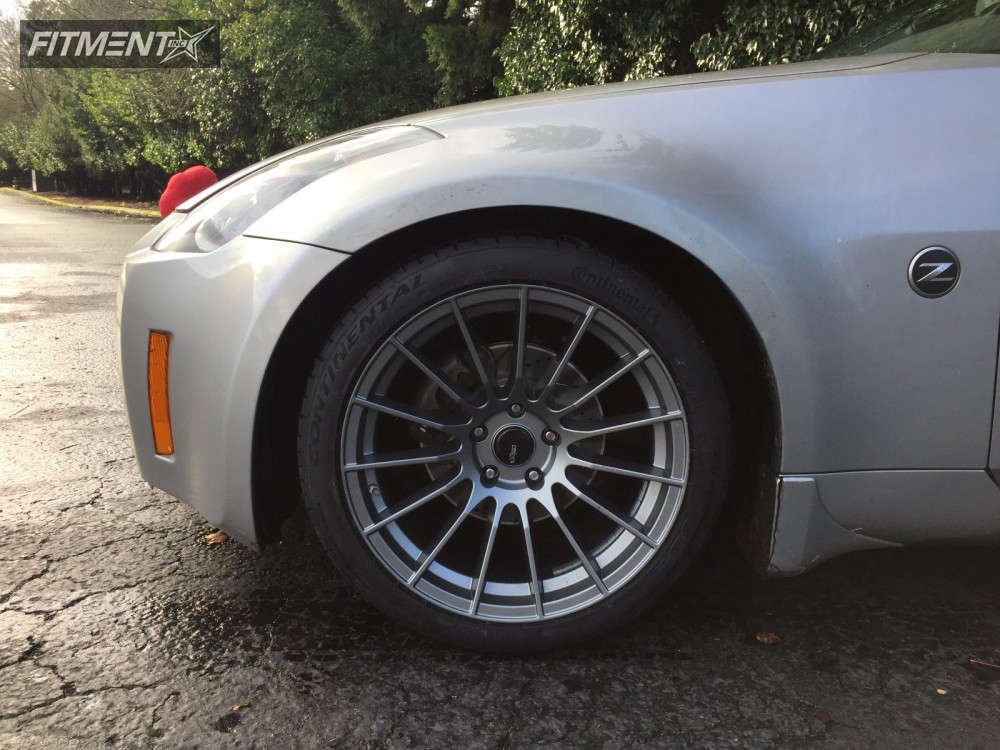 2005 Nissan 350Z Base with 18x9.5 Ambit RE02 and Continental 265x35 on ...