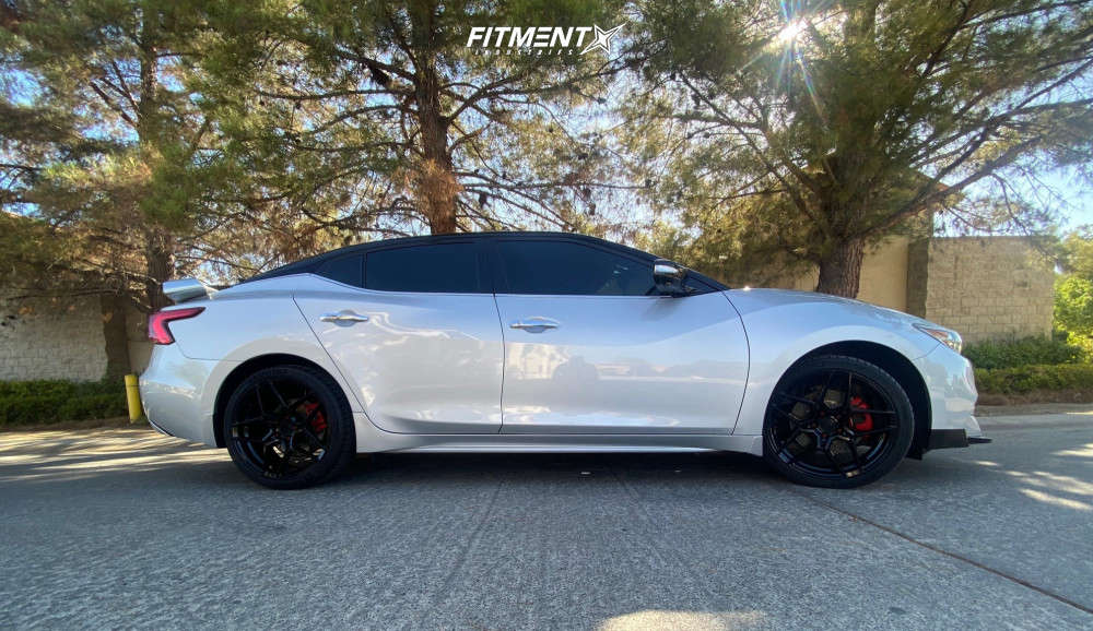 Nissan Maxima Black Rims