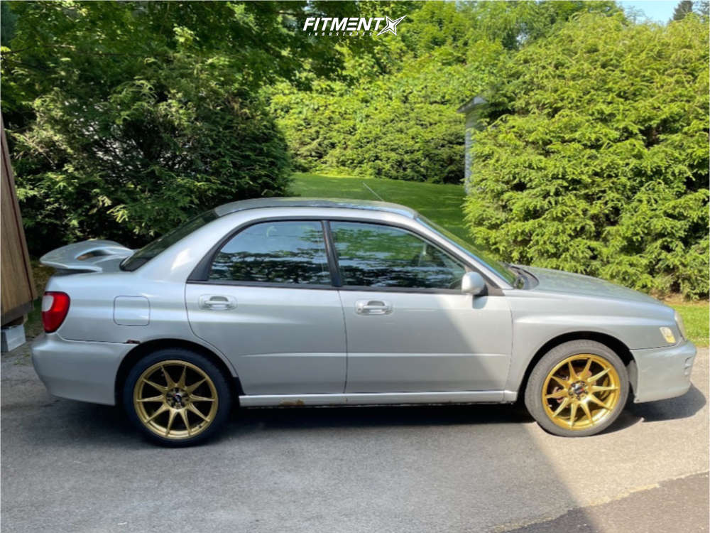 2002 Subaru Impreza RS with 18x8.75 XXR 527 and Lexani 235x40 on Stock ...