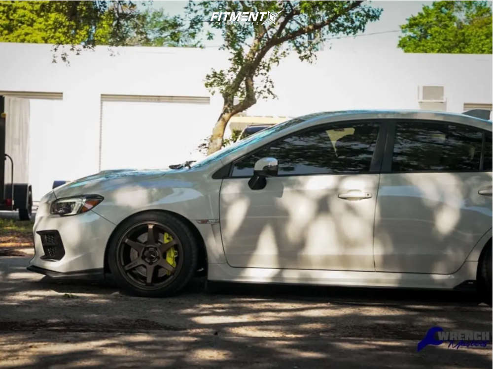 2018 Subaru WRX STI Base with 18x9.5 Enkei T6r and Continental 265x35 on Stock Suspension ...