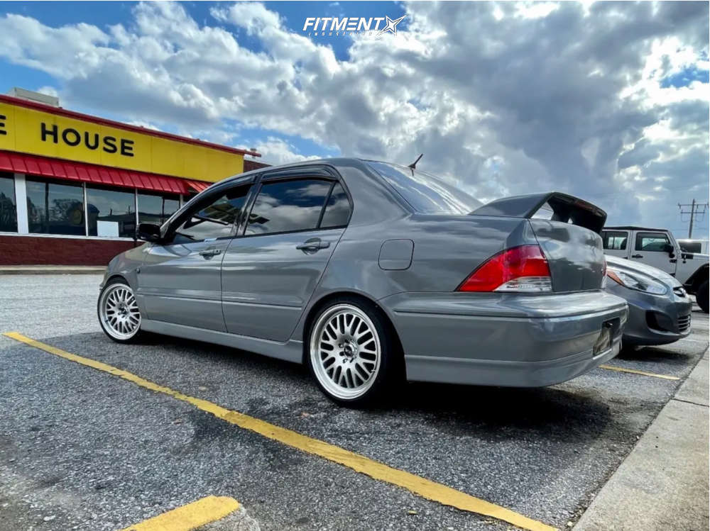 2002 Mitsubishi Lancer OZ Rally with 17x8 XXR 531 and Ironman 205x40 on ...