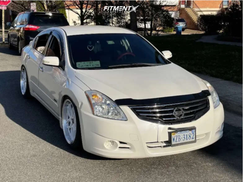 2010 Nissan Altima Hybrid with 19x9.5 ESR Cs15 and Cooper 235x40 on ...