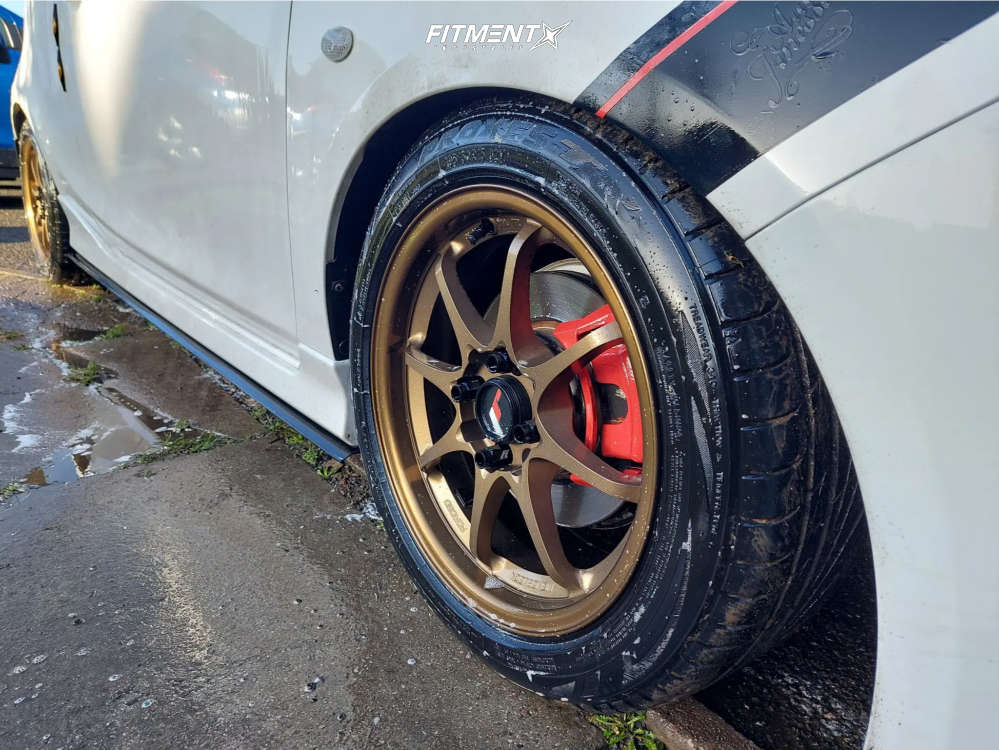 2010 Mazda 2 Sport with 15x7 Japan Racing Jr5 and Toyo Tires 195x55 on ...