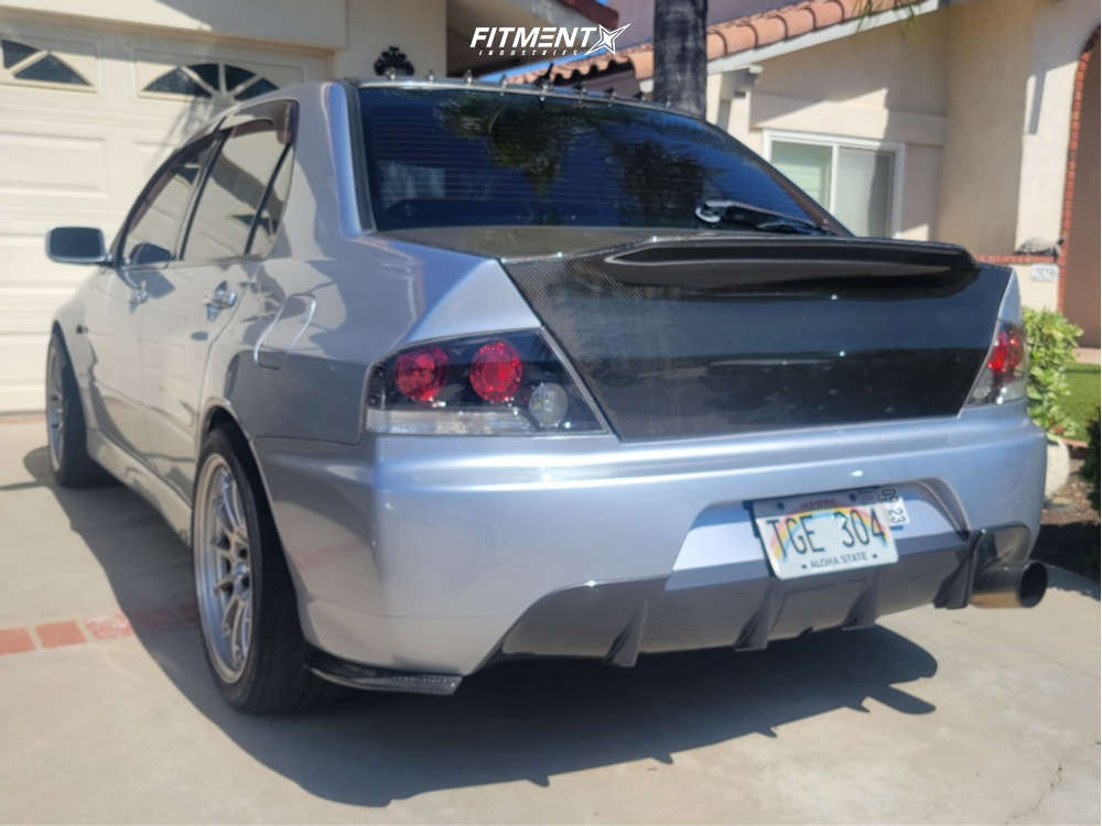2003 Mitsubishi Lancer Evolution with 18x9.5 Enkei NT03M and Falken ...