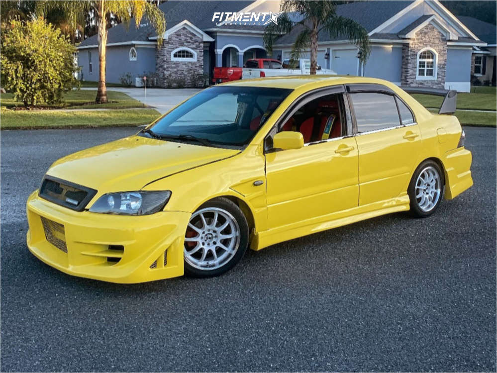 2002 Mitsubishi Lancer OZ Rally with 16x7 Konig Lightning and Toyo ...