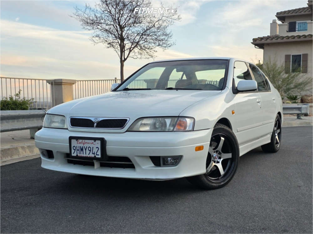 1999 INFINITI G20 Base with 17x7.5 Spec-1 Spt-31 and Uniroyal 225x45 on Stock Suspension ...