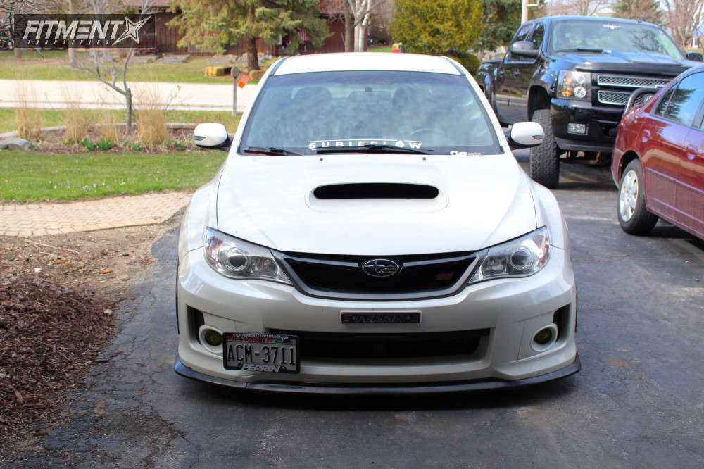 2012 Subaru WRX STI with 18x9.5 Enkei Nt03 and Falken 235x40 on ...