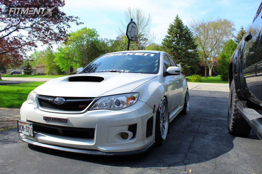 2012 Subaru WRX STI with 18x9.5 Enkei Nt03 and Falken 235x40 on ...