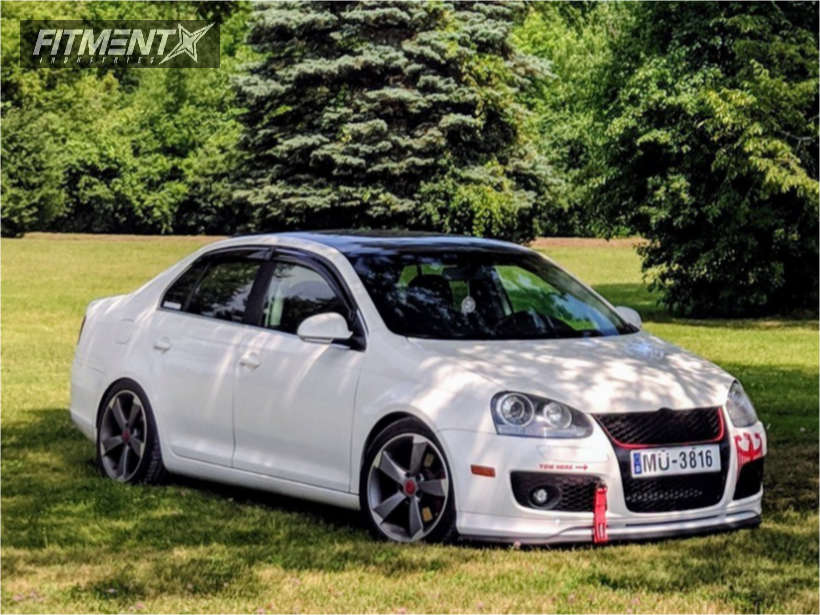 2008 Volkswagen Jetta with 17x8 OEM Wheels Rotor and Falken 225x45 on ...