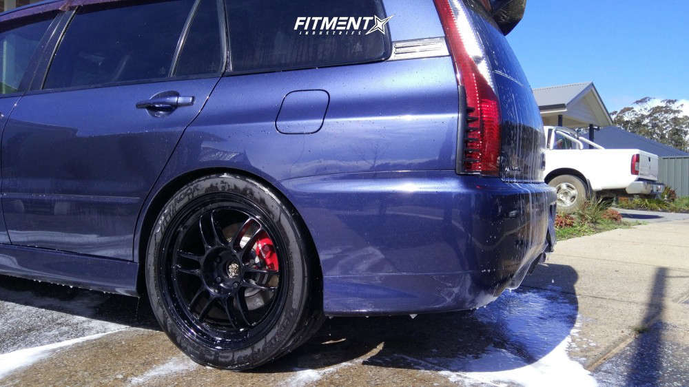2005 Mitsubishi Lancer Evolution with 18x8.5 Enkei RPF1 and Hankook ...