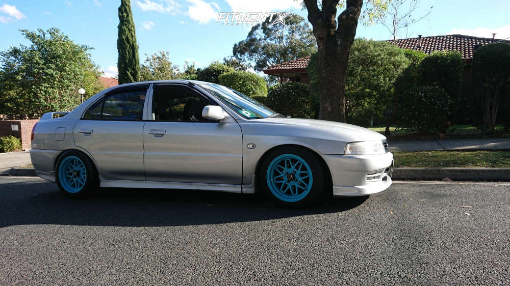 2000 Mitsubishi Mirage LS with 15x8.5 AME Fatlace Fzero2 and Hankook ...