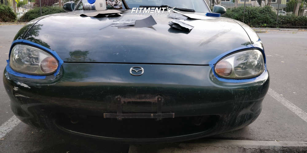 1999 Mazda Miata Base with 15x7 Konig Rewind and Nitto 205x50 on Stock ...