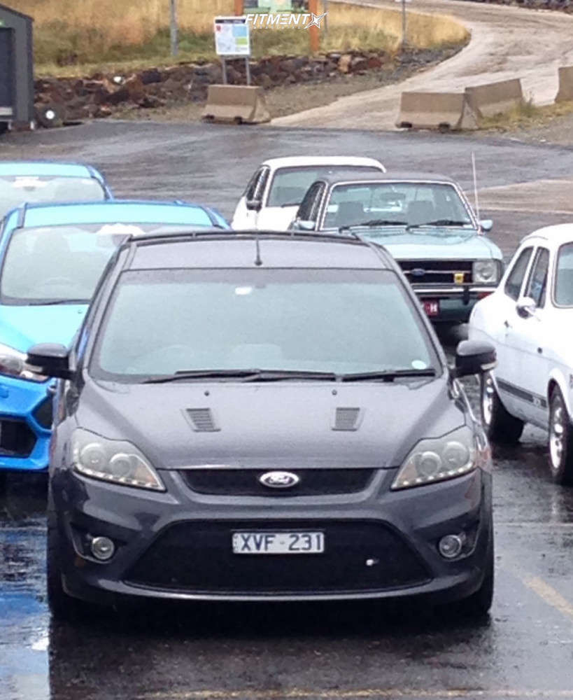 2010 Ford Focus S with 19x8.5 OEM Wheels Kuga Titanium and Bridgestone ...