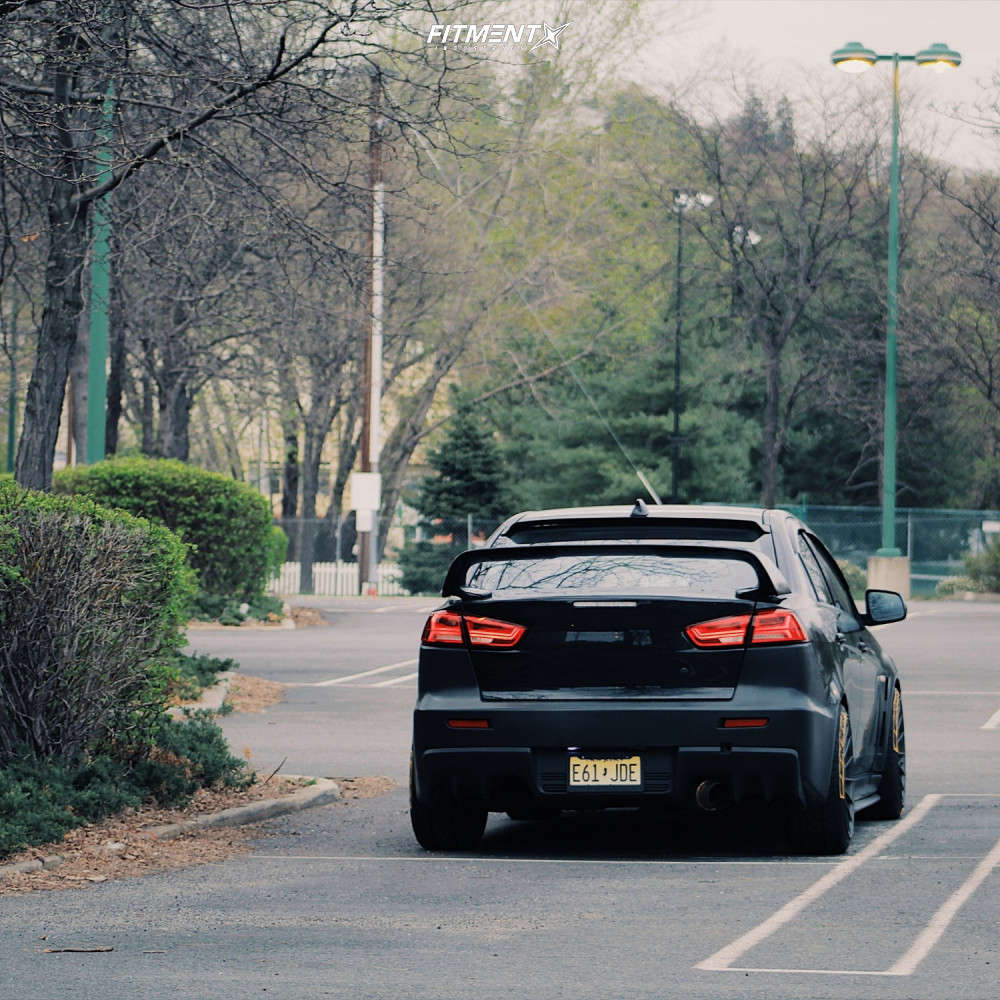 2010 Mitsubishi Lancer GTS with 18x9.5 Ambit Re02 and Nitto 235x40 on ...