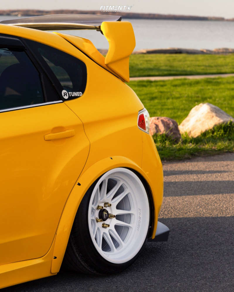 2011 Subaru WRX STI Base with 18x11 Cosmis Racing XT-206R and Nankang 255x35 on Air Suspension ...