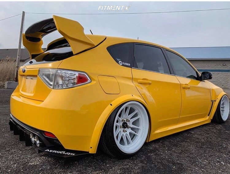 2011 Subaru WRX STI Base with 18x11 Cosmis Racing XT-206R and Nankang 255x35 on Air Suspension ...