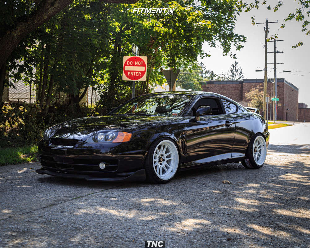 2004 Hyundai Tiburon GT with 18x9.5 Cosmis Racing XT-206R and Kenda ...
