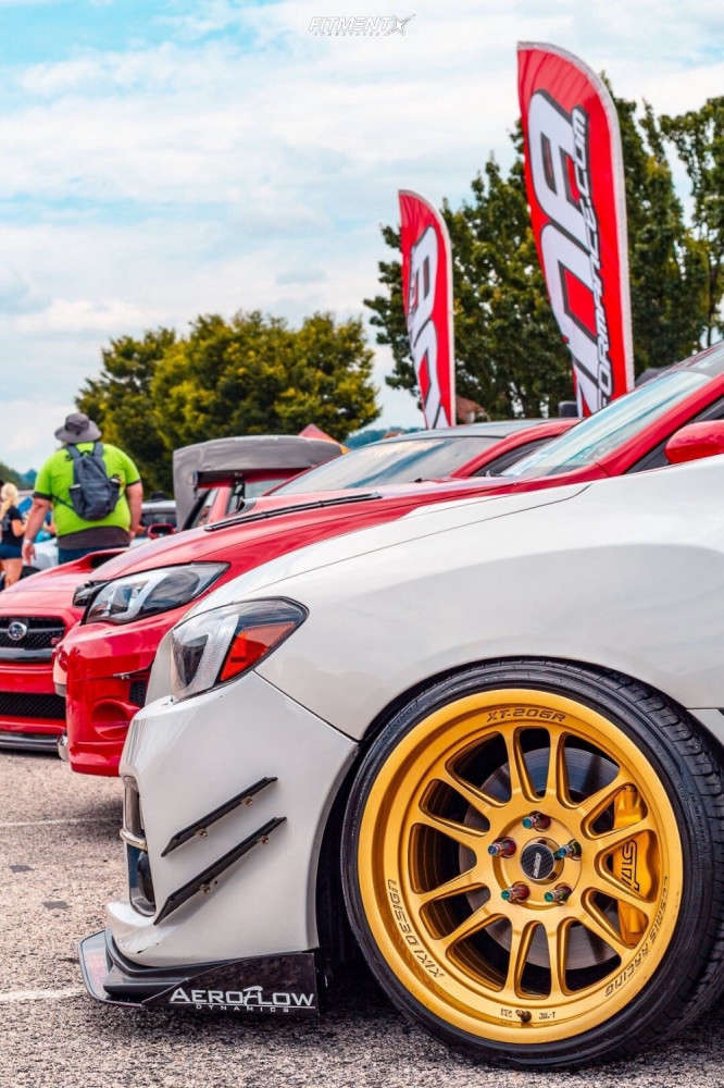 2016 Subaru WRX STI Base with 18x9.5 Cosmis Racing XT-206R and Kumho 215x35 on Air Suspension ...